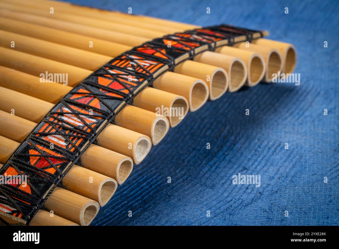 bamboo pan flute instrument from Peru against textured art paper Stock ...