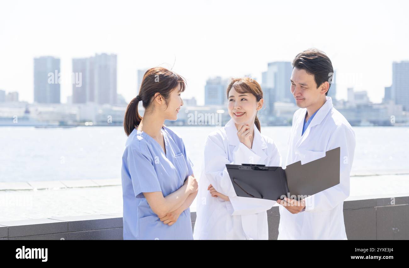 Japanese doctor and carer Stock Photo - Alamy