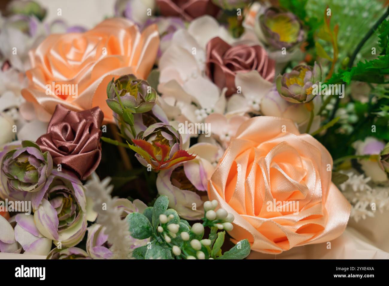 Beautiful arrangement of handcrafted flowers in soft pastel colors ...