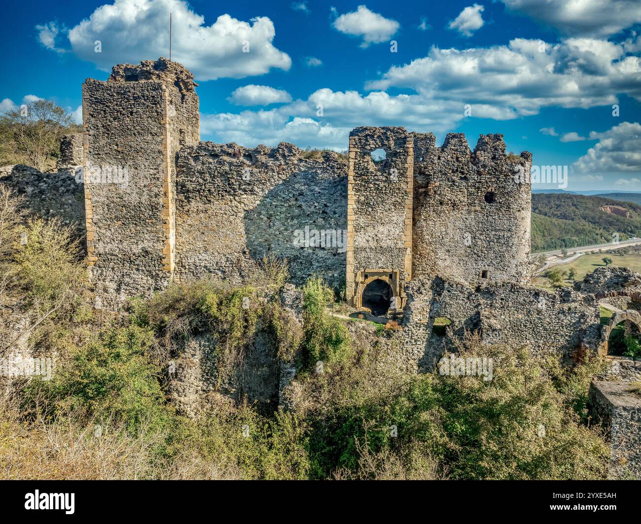 Aerial view of Soimos medieval castle ruin above the Mures river in ...