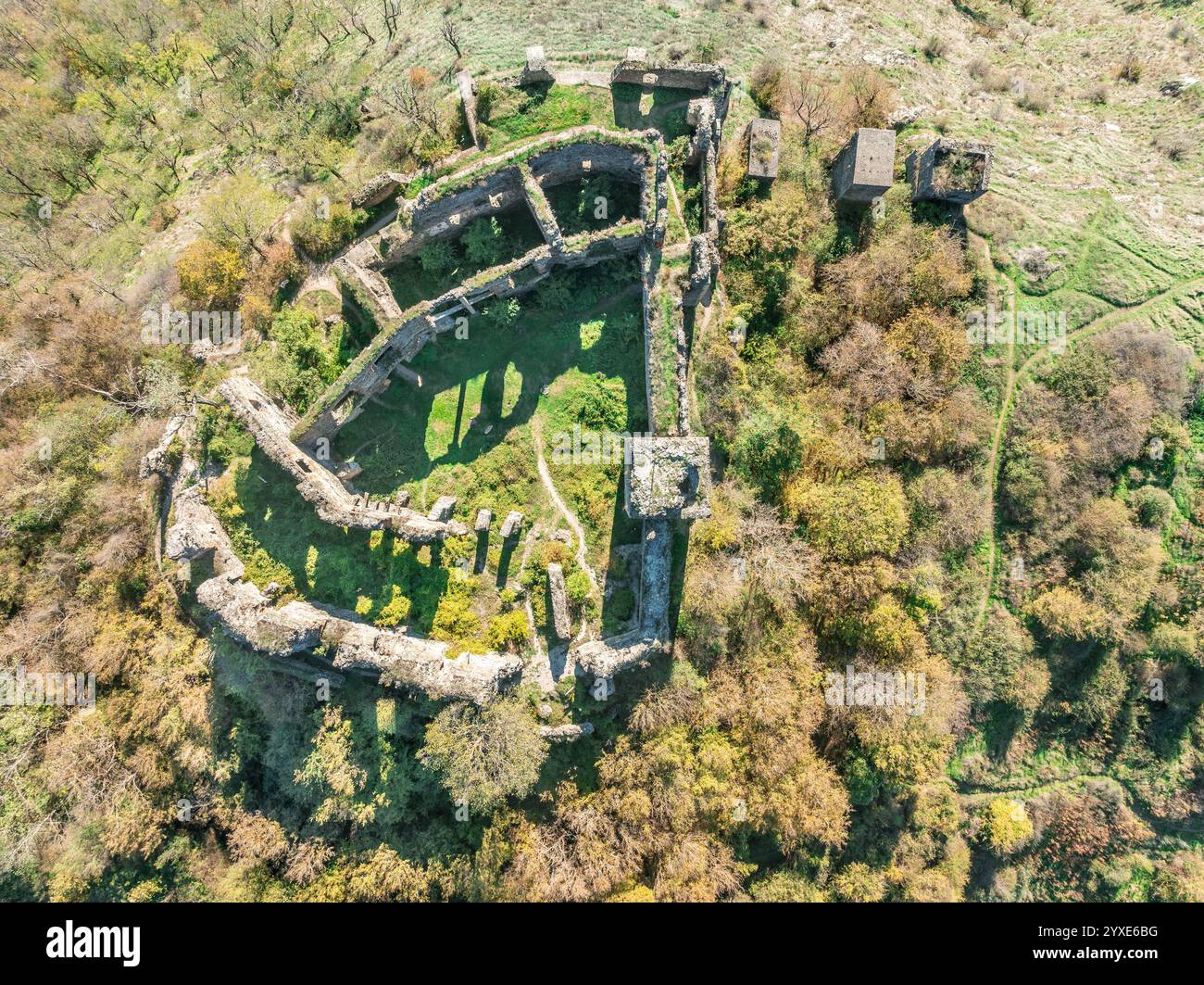 Aerial view of Soimos medieval castle ruin above the Mures river in ...