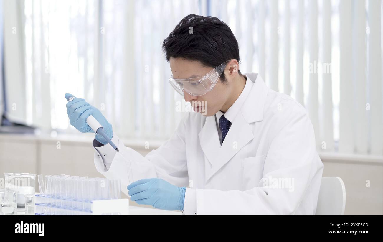 Japanese male researcher Stock Photo - Alamy
