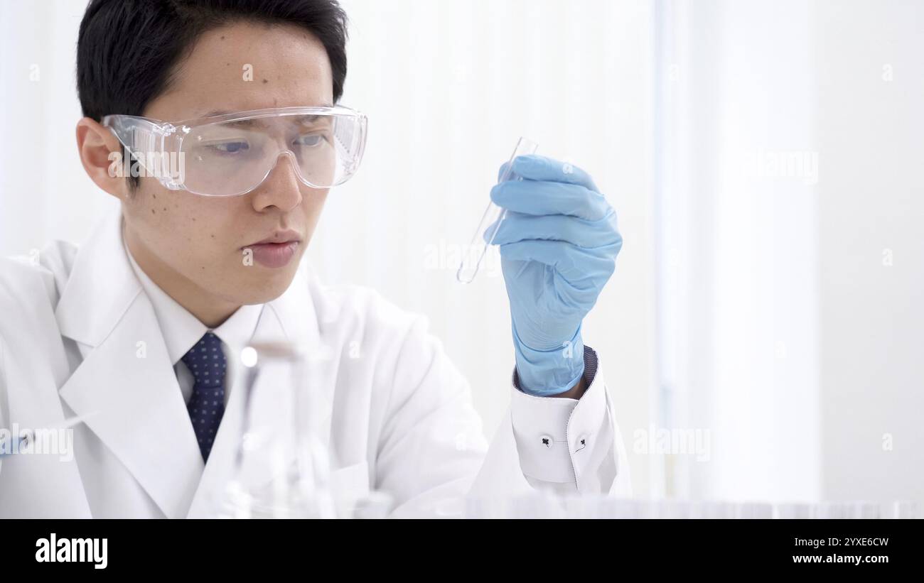 Japanese male researcher Stock Photo - Alamy