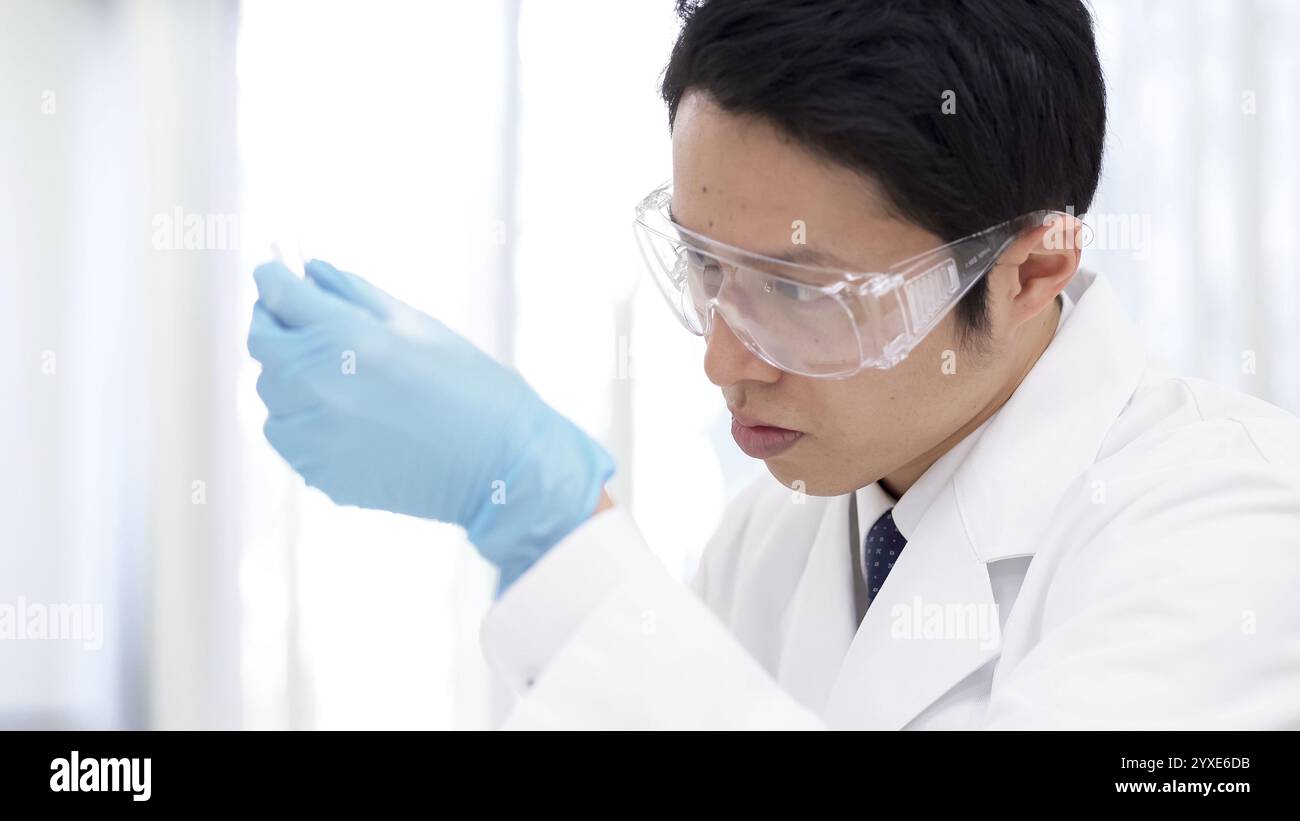 Japanese male researcher Stock Photo - Alamy