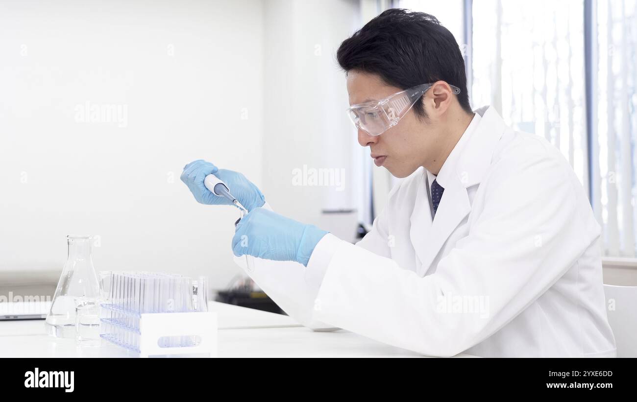 Japanese male researcher Stock Photo - Alamy