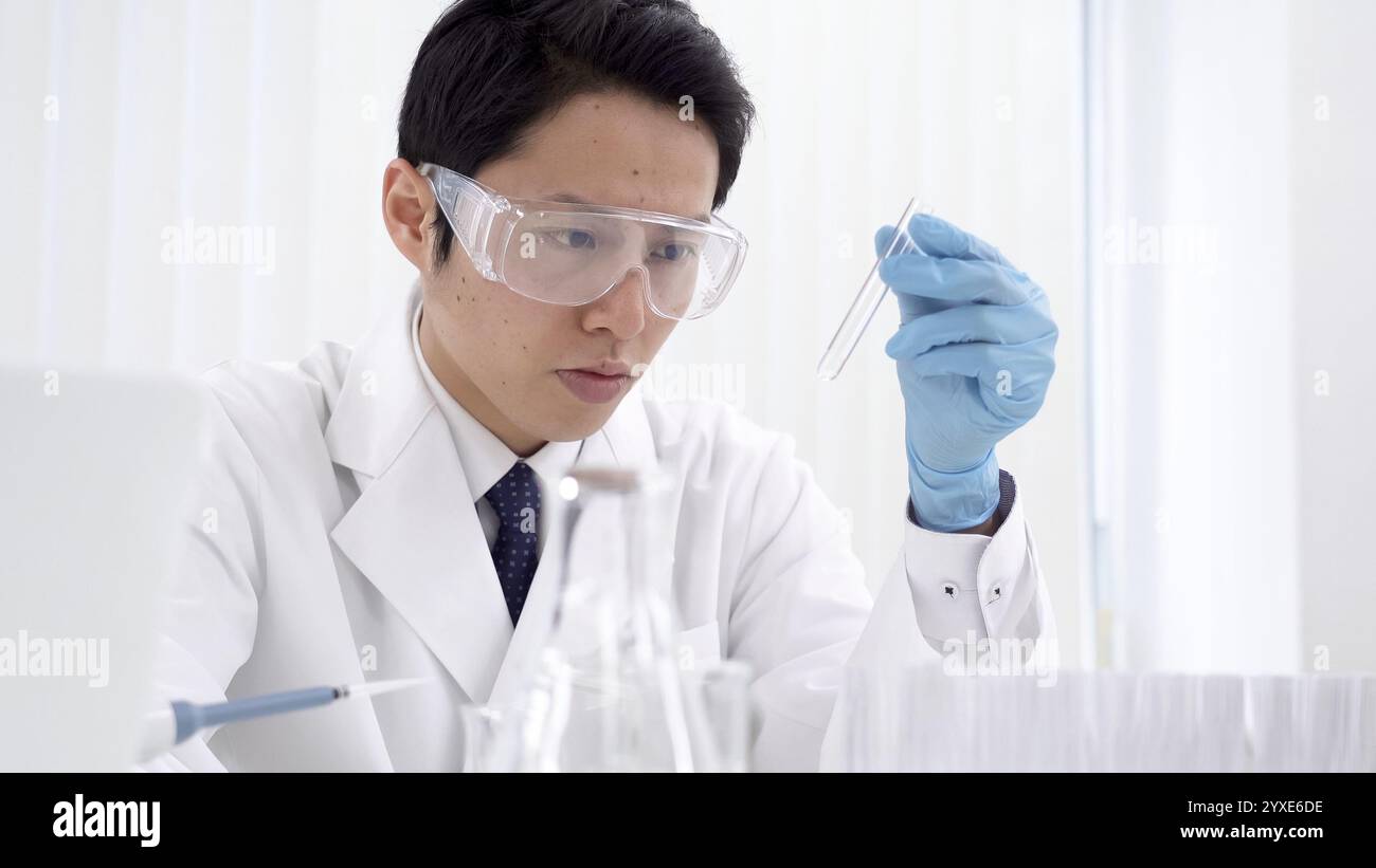 Japanese male researcher Stock Photo - Alamy