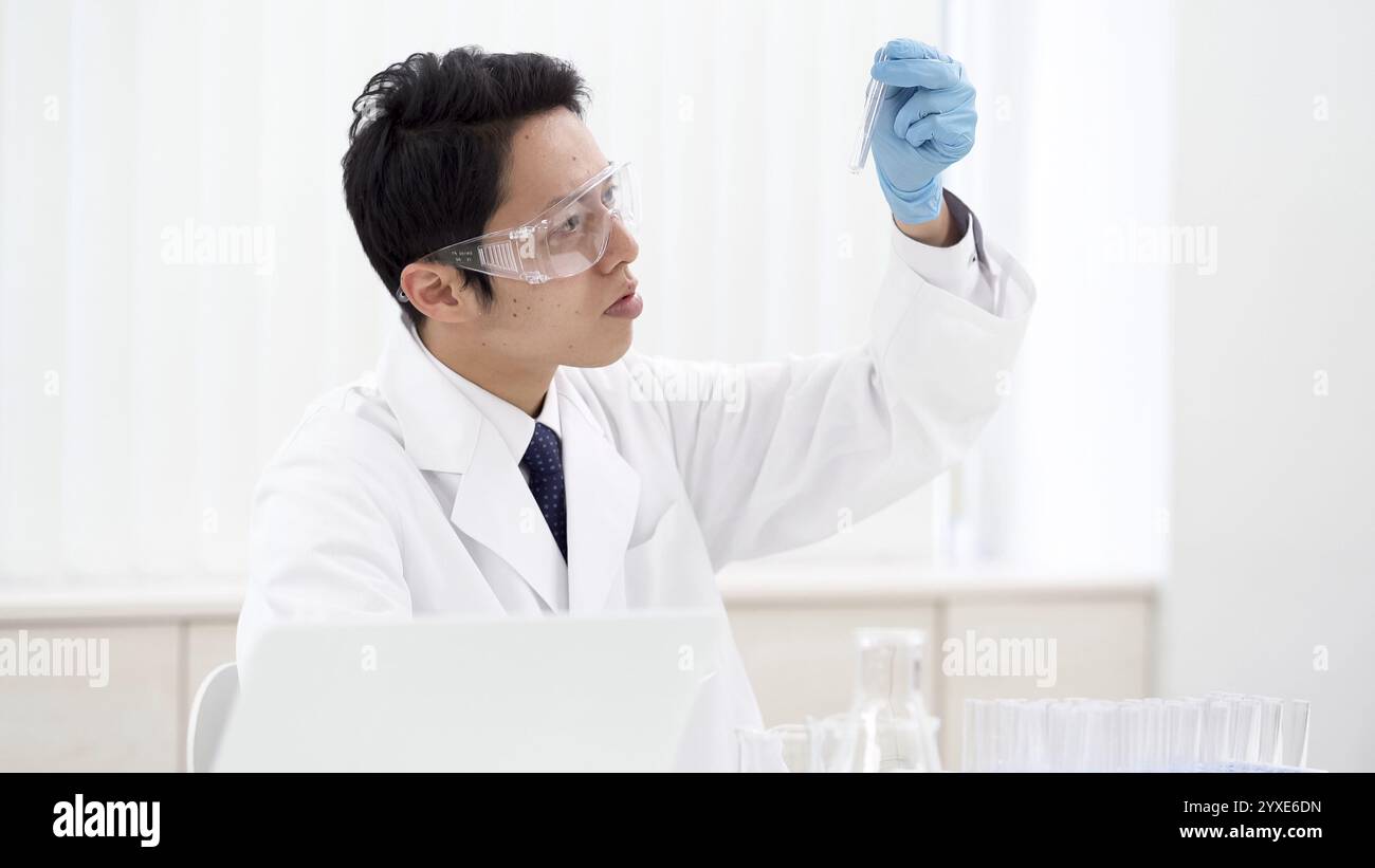 Japanese male researcher Stock Photo - Alamy