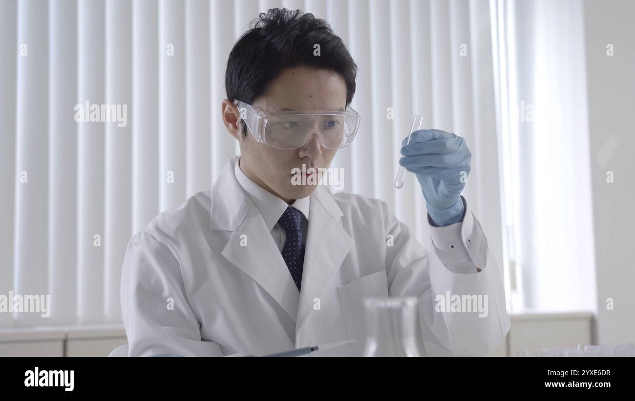Japanese male researcher Stock Photo - Alamy