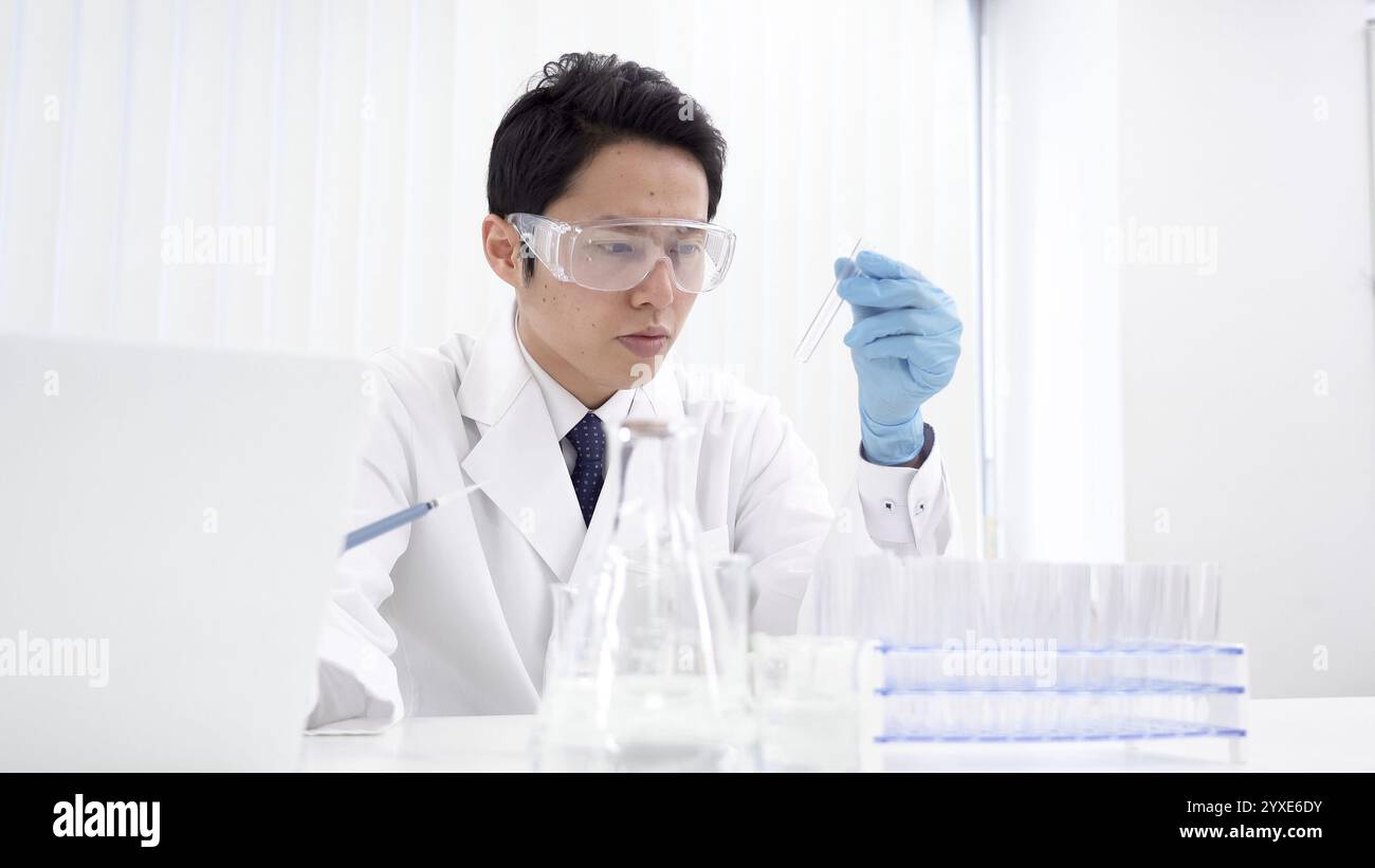 Japanese male researcher Stock Photo - Alamy