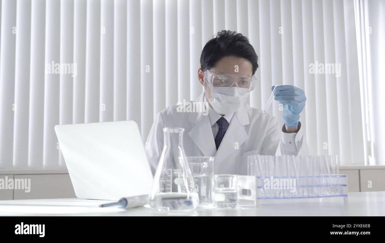 Japanese male researcher Stock Photo - Alamy