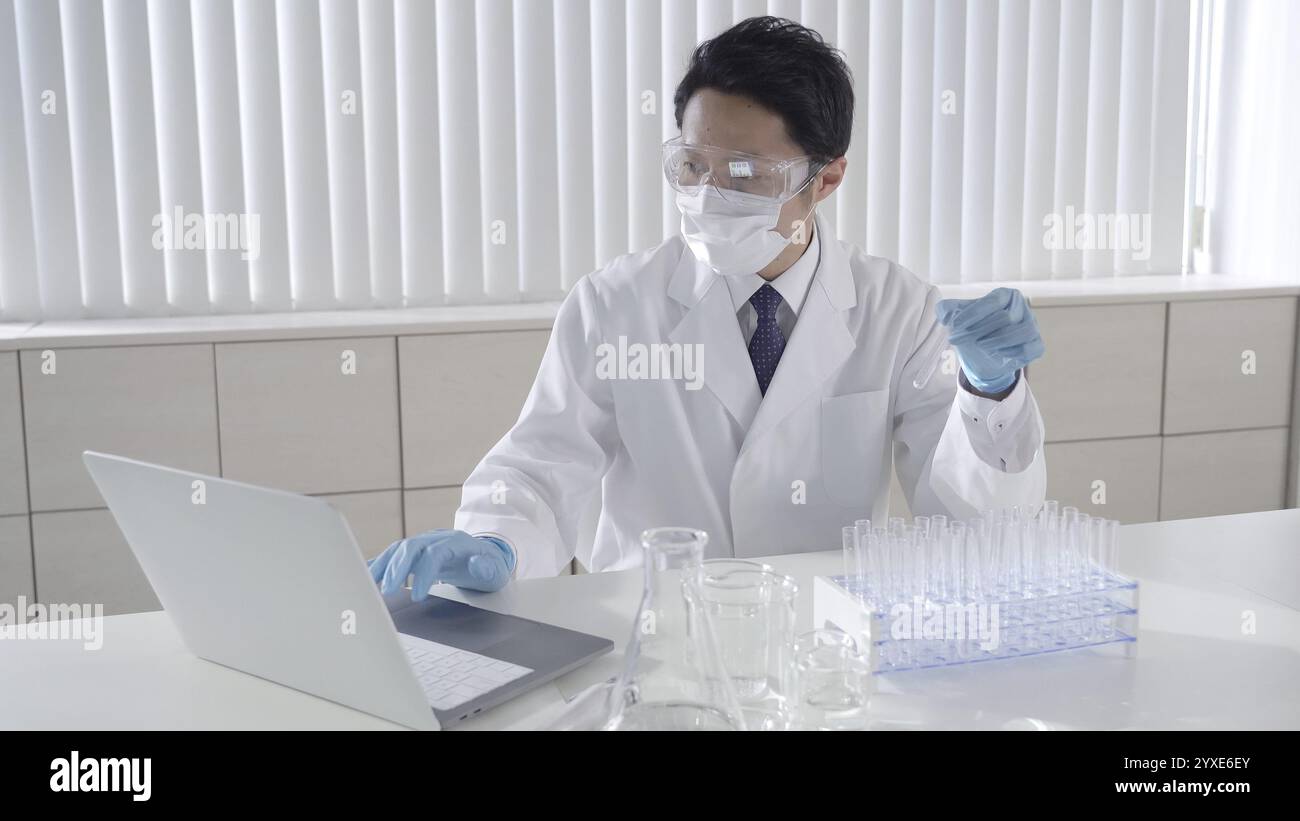 Japanese male researcher Stock Photo - Alamy