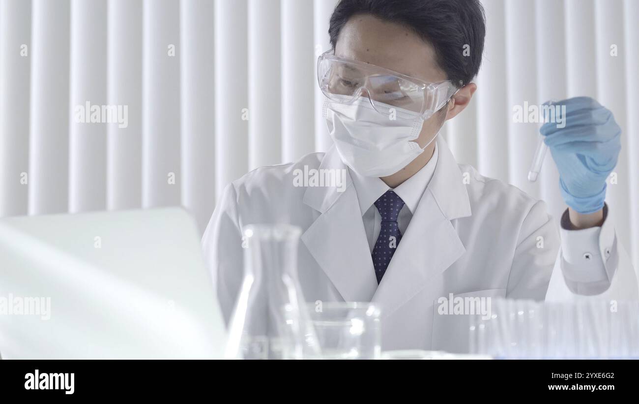 Japanese male researcher Stock Photo - Alamy
