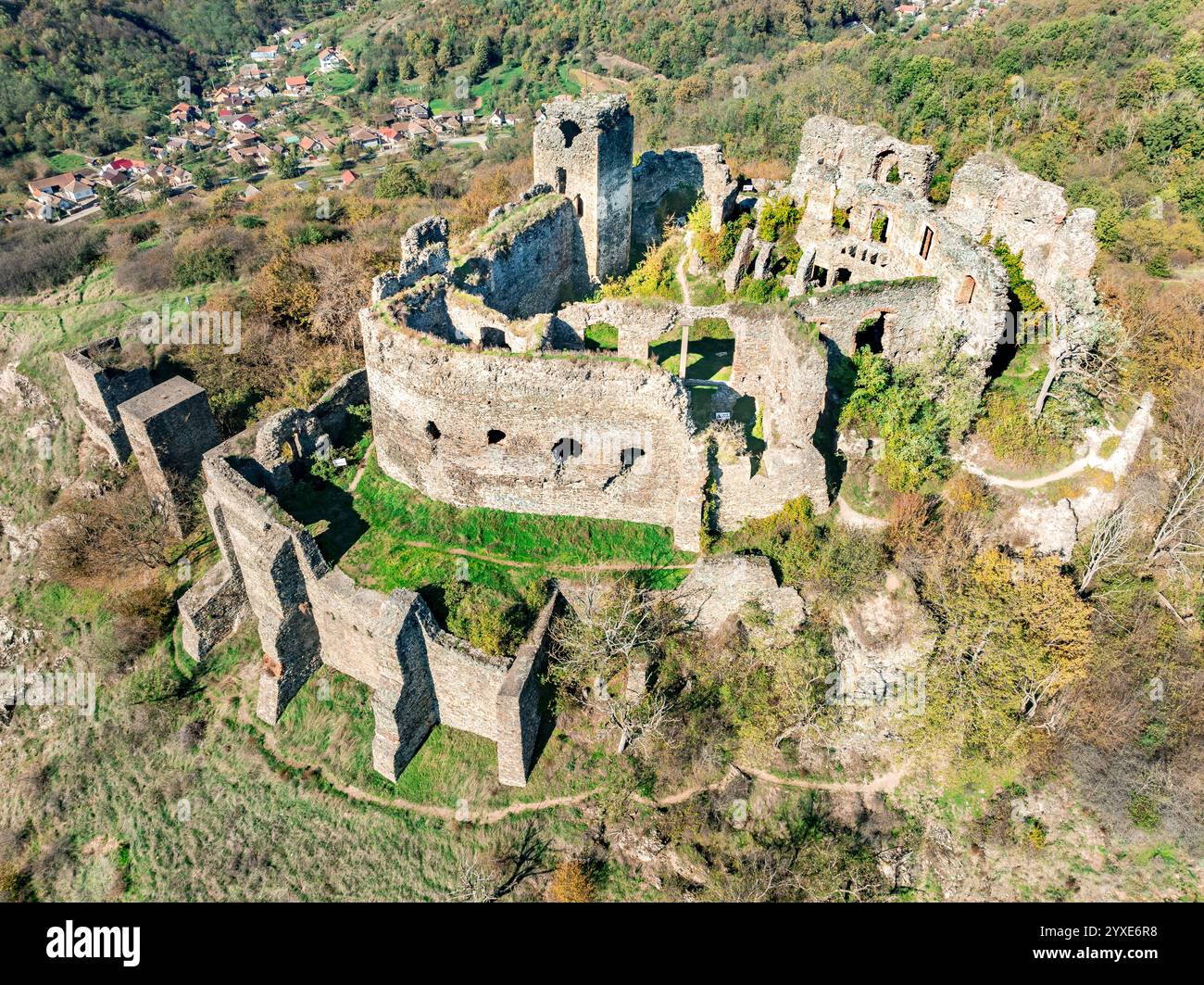 Aerial view of Soimos medieval castle ruin above the Mures river in ...