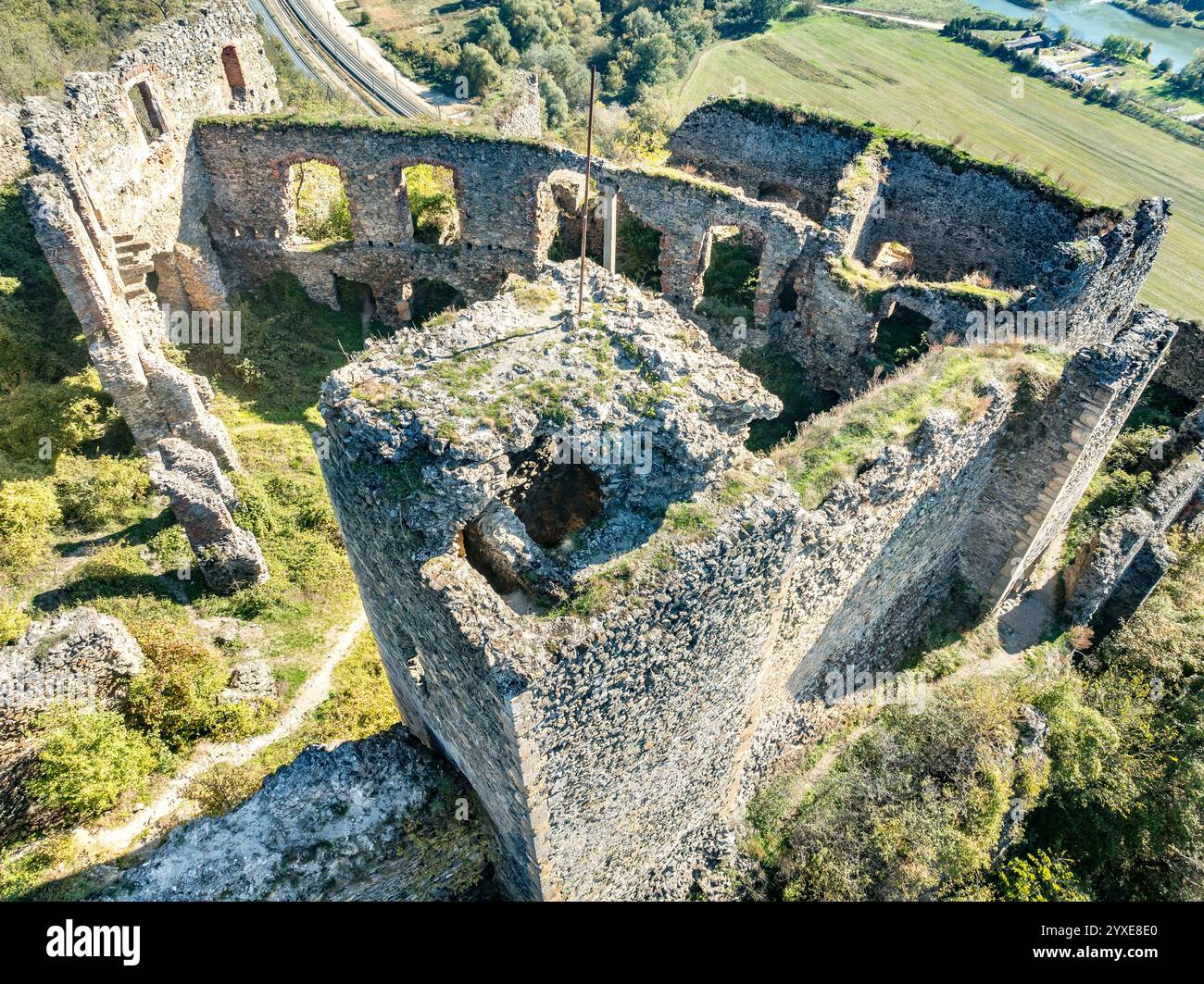 Aerial view of Soimos medieval castle ruin above the Mures river in ...