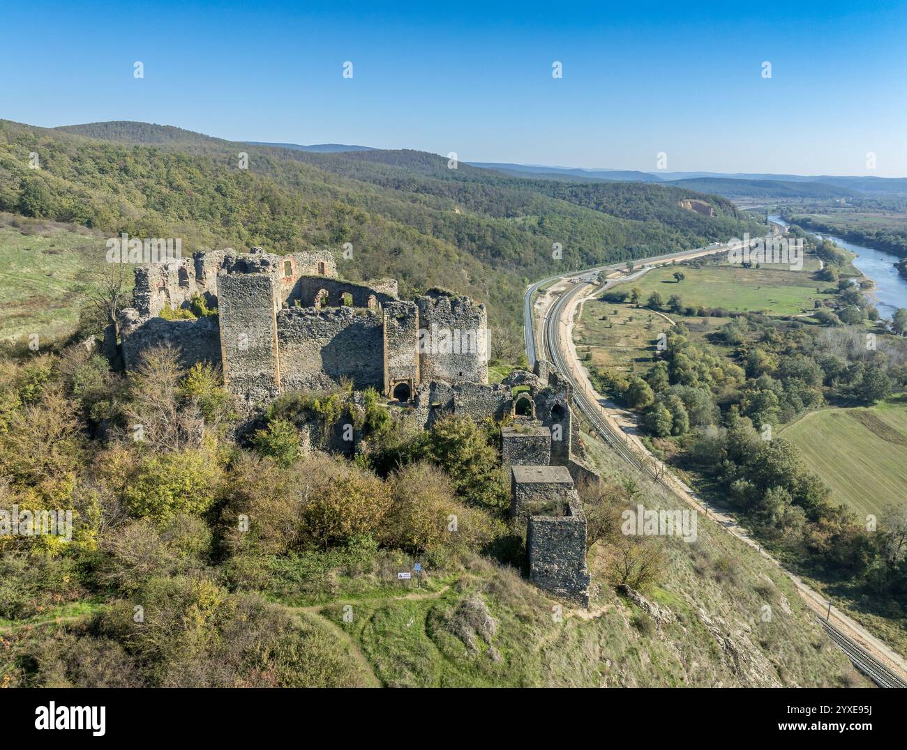 Aerial view of Soimos medieval castle ruin above the Mures river in ...