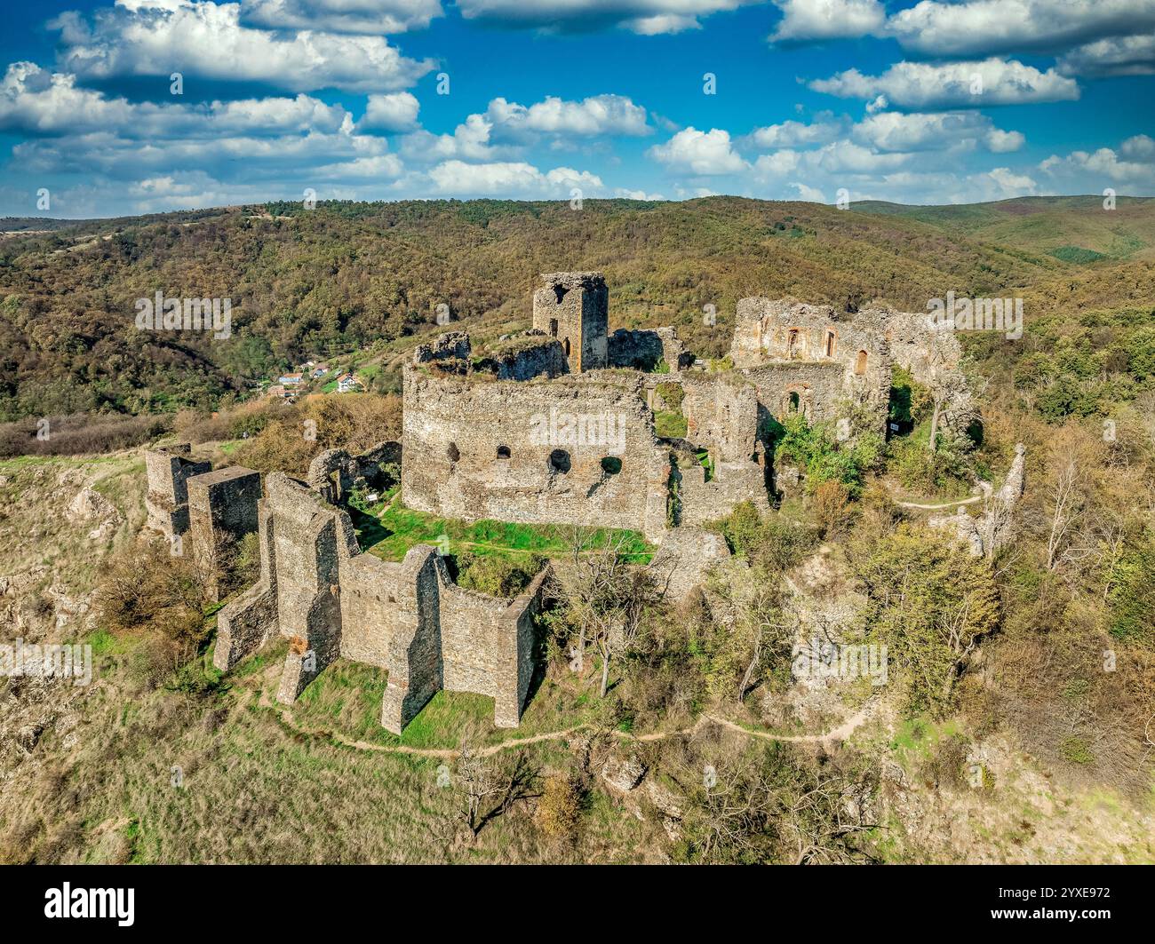 Aerial view of Soimos medieval castle ruin above the Mures river in ...