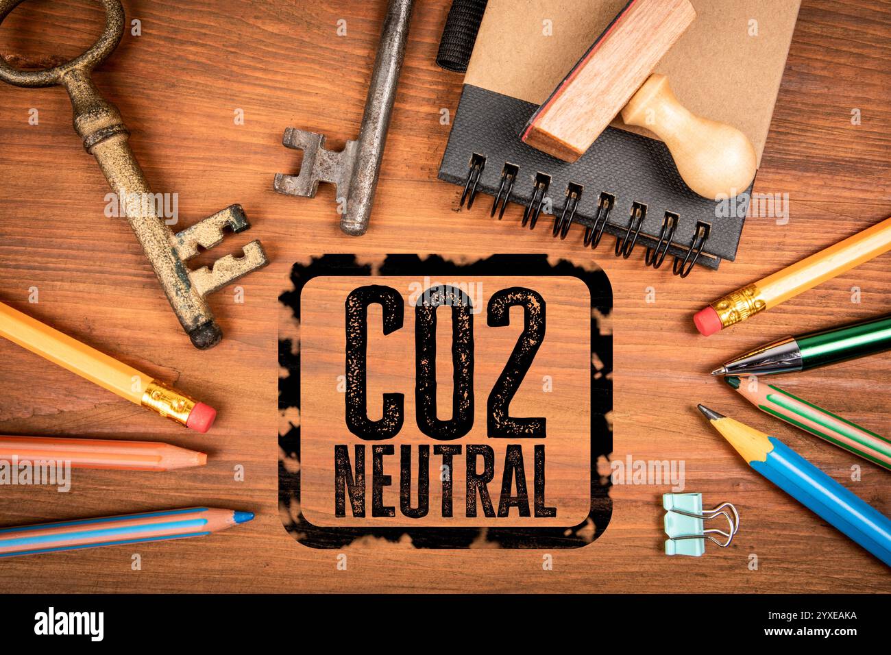 CO2 neutral. Stamp on wood texture background. Office desk Stock Photo ...