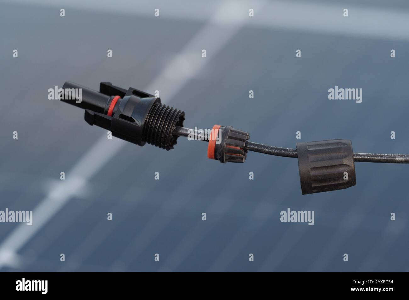 Close-up of a solar panel connector showcasing electrical wiring and ...