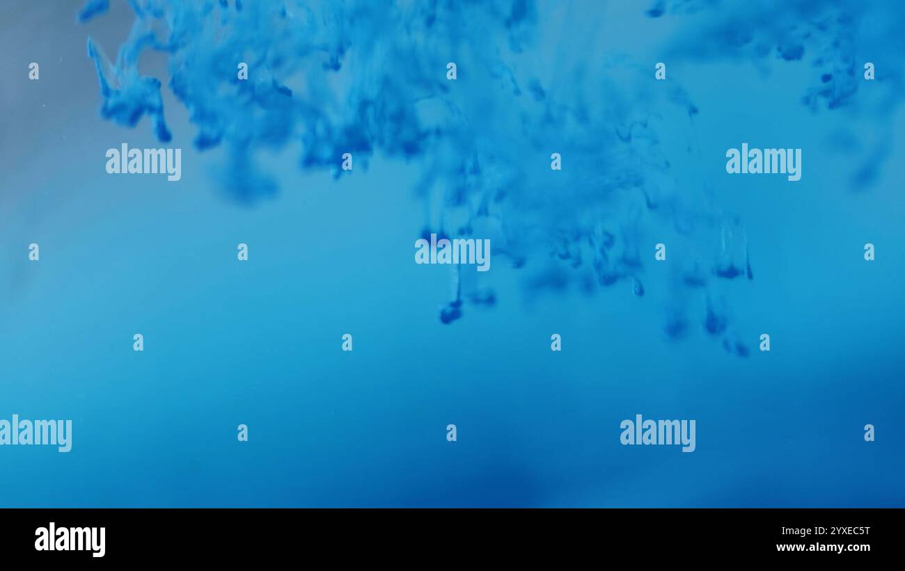 Color drop water. Magic spell. Defocused sparkling splash paint fluid ...