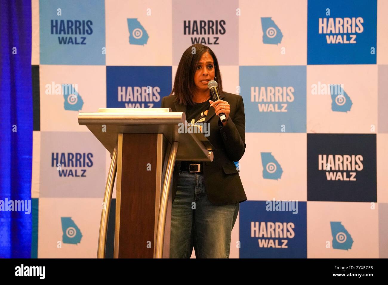Maya Harris speaks onstage during a Peach State Women for Harris Walz ...