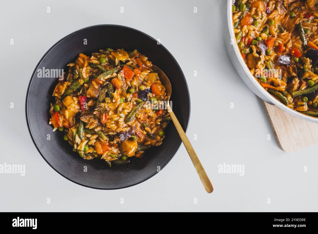 Mediterranean risoni with mixed vegetables and tomato sauce , healthy ...