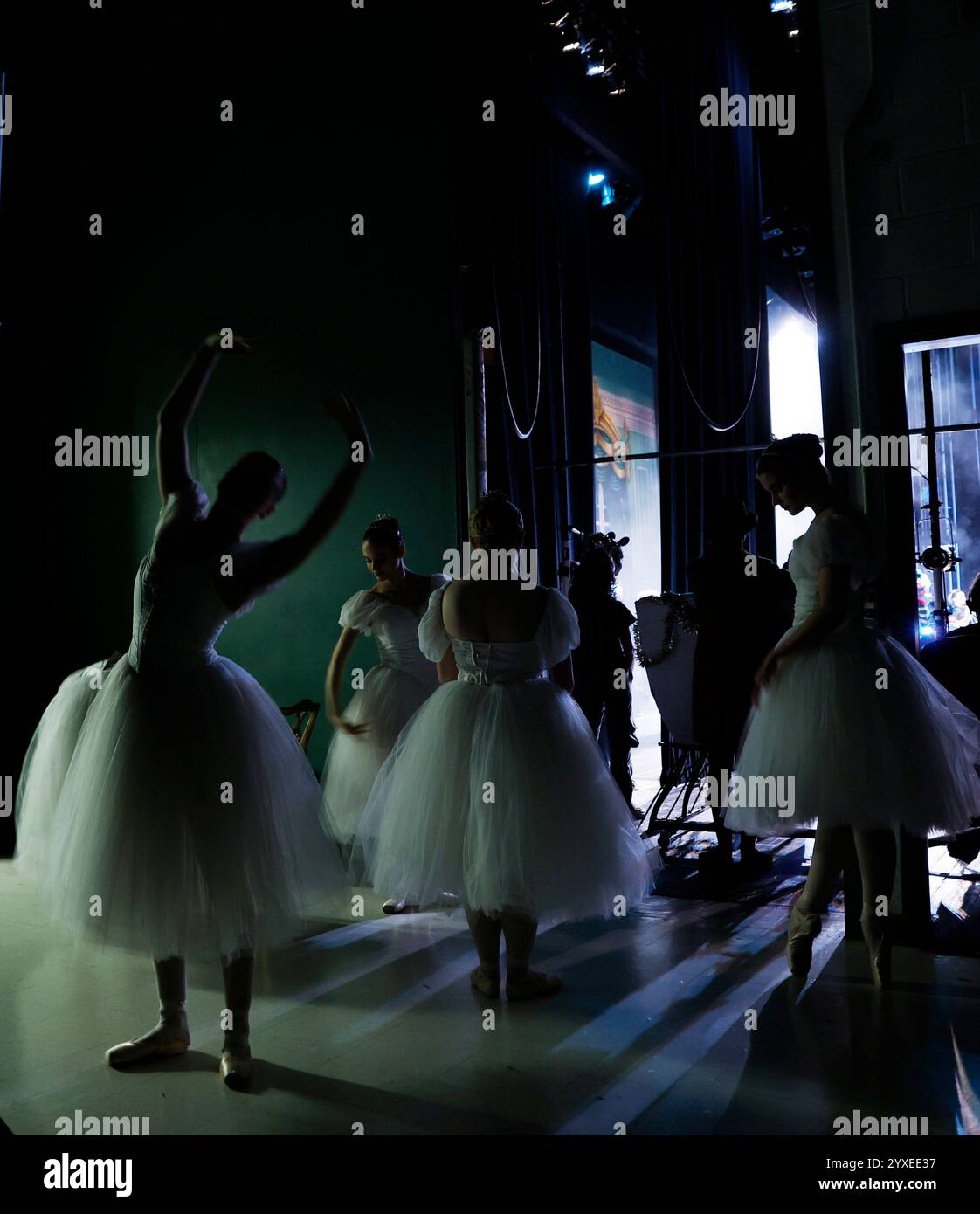 Queens, United States. 15th Dec, 2024. Dancers wait in the wings before ...