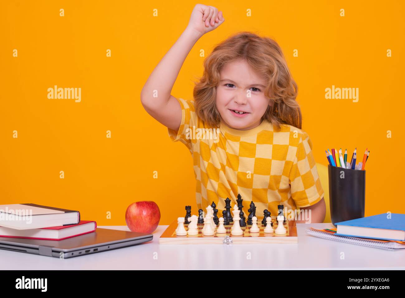 Child play chess on isolated background. Child genius, smart pupil ...