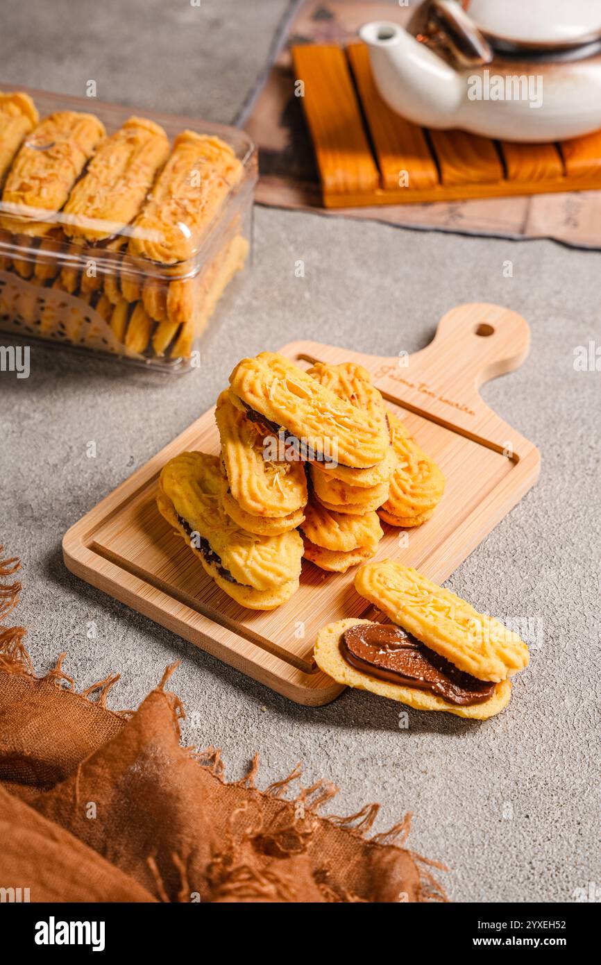 Kue lidah kucing with chocolate jam is a small Indonesian biscuit (kue ...