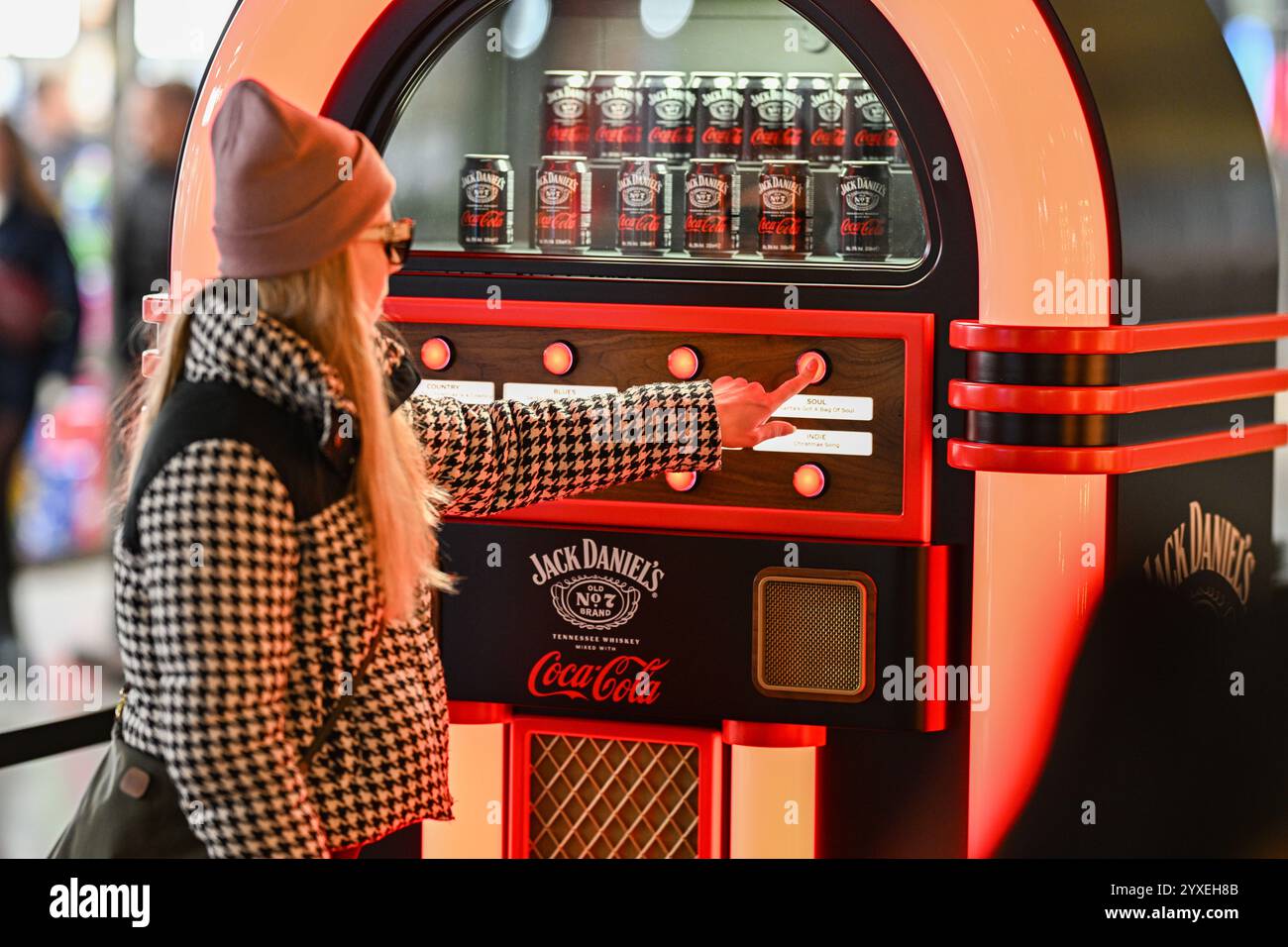 EDITORIAL USE ONLY Members of the public pick alternative festive songs ...