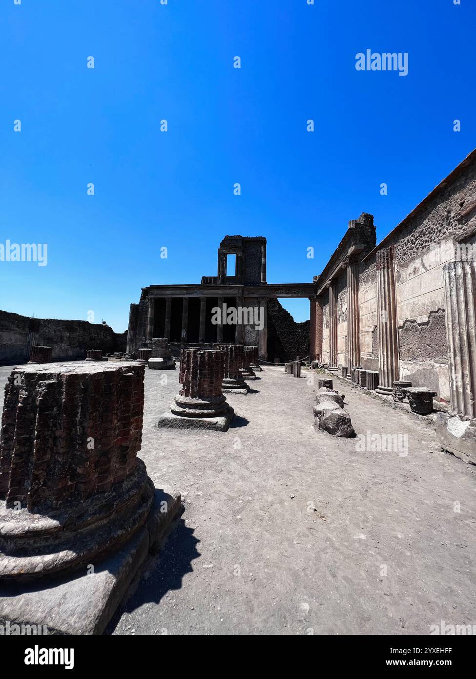 Explore the ancient ruins with remnants of historic columns and ...