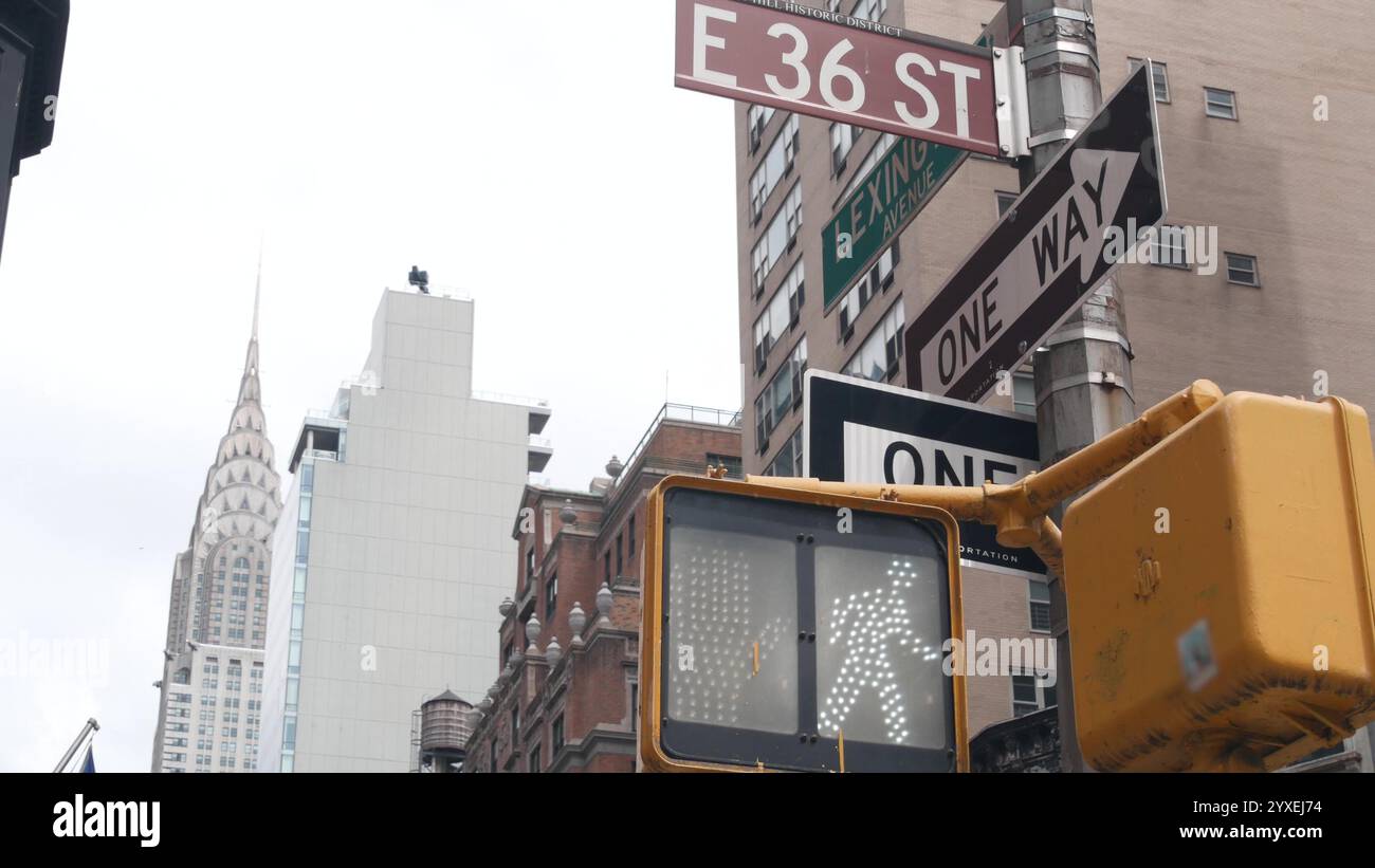 New York City crossroad, Lexington street intersection road sign post ...