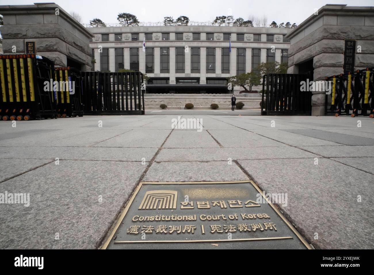 A sign of the Constitutional Court is seen on the ground in front of ...