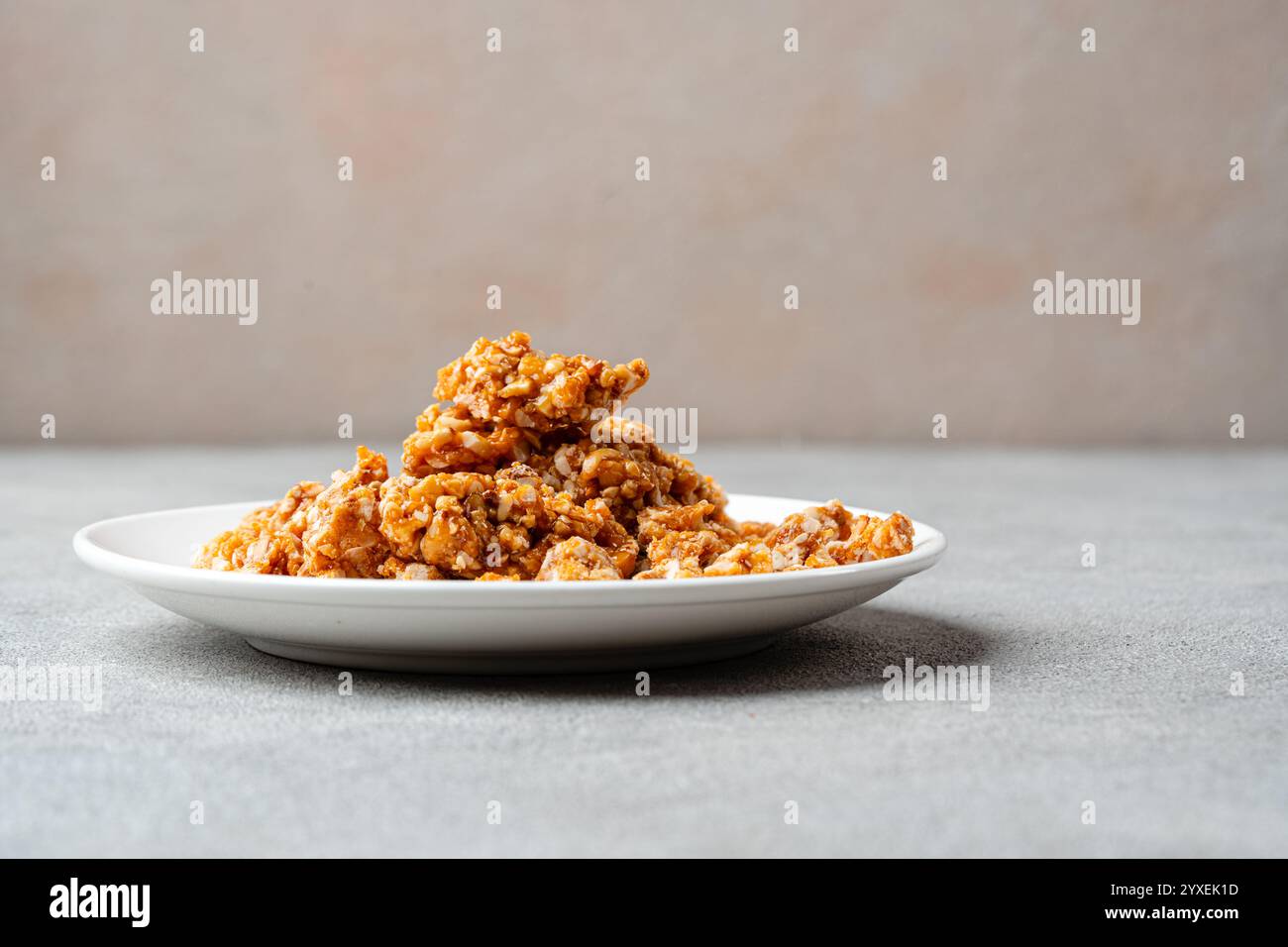Crushed caramel peanut brittle hi-res stock photography and images - Alamy