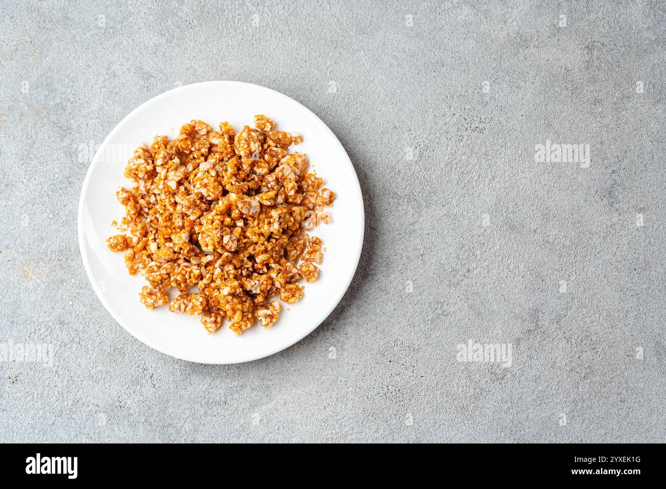 Crushed caramel peanut brittle hi-res stock photography and images - Alamy