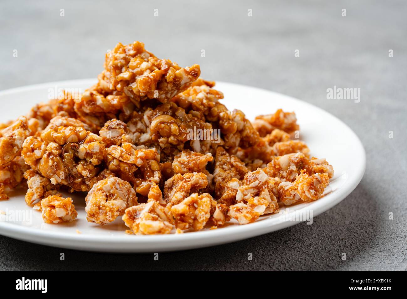 Crushed caramel peanut brittle hi-res stock photography and images - Alamy