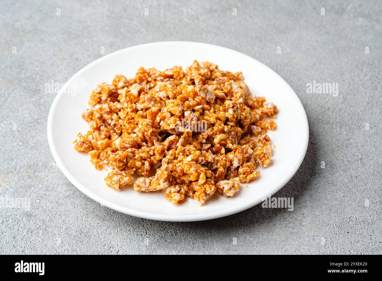 Crushed caramel peanut brittle hi-res stock photography and images - Alamy