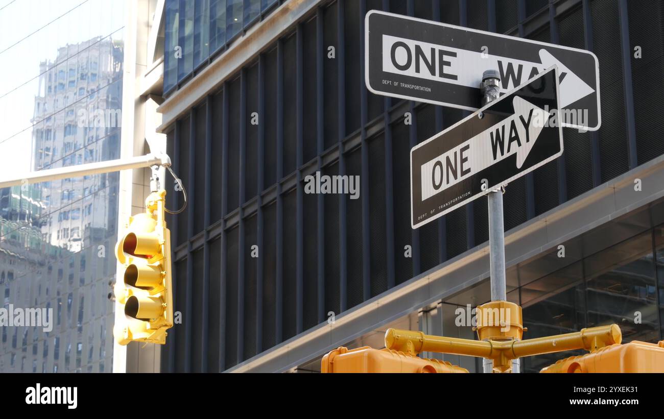New York City street crossroad, yellow traffic light, oneway transport ...