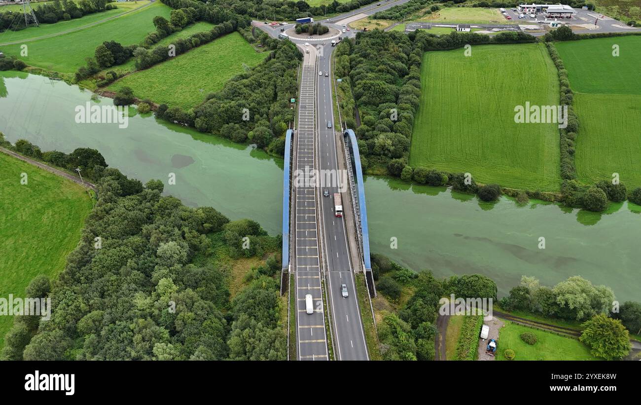 Blue green algae on the river bann where it meets lough neagh near the ...