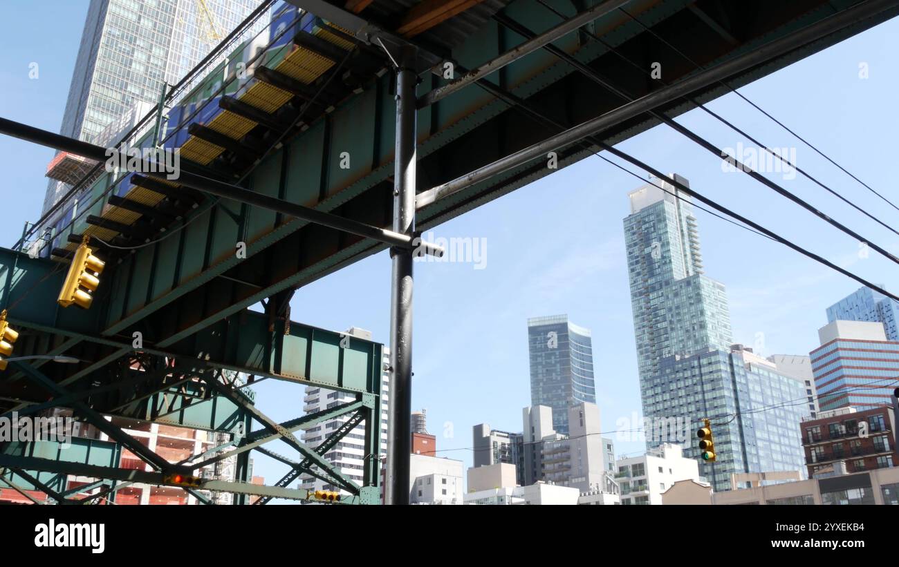 New York elevated subway, metropolitan bridge, metro track above street ...