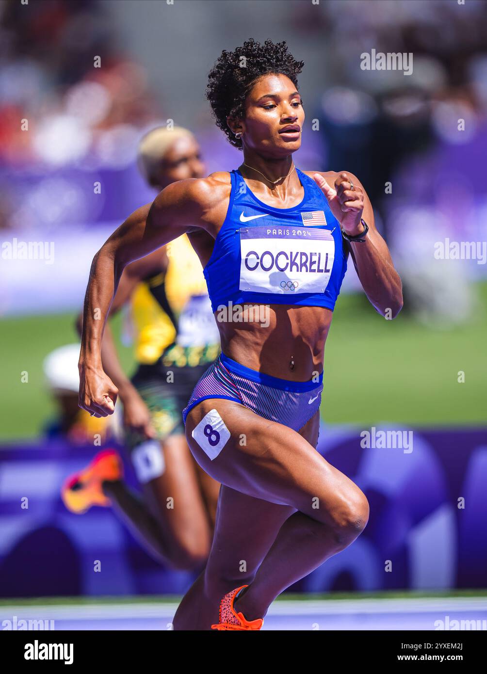 Anna Cockrell participating in the 400 meters hurdles at the Paris 2024 ...