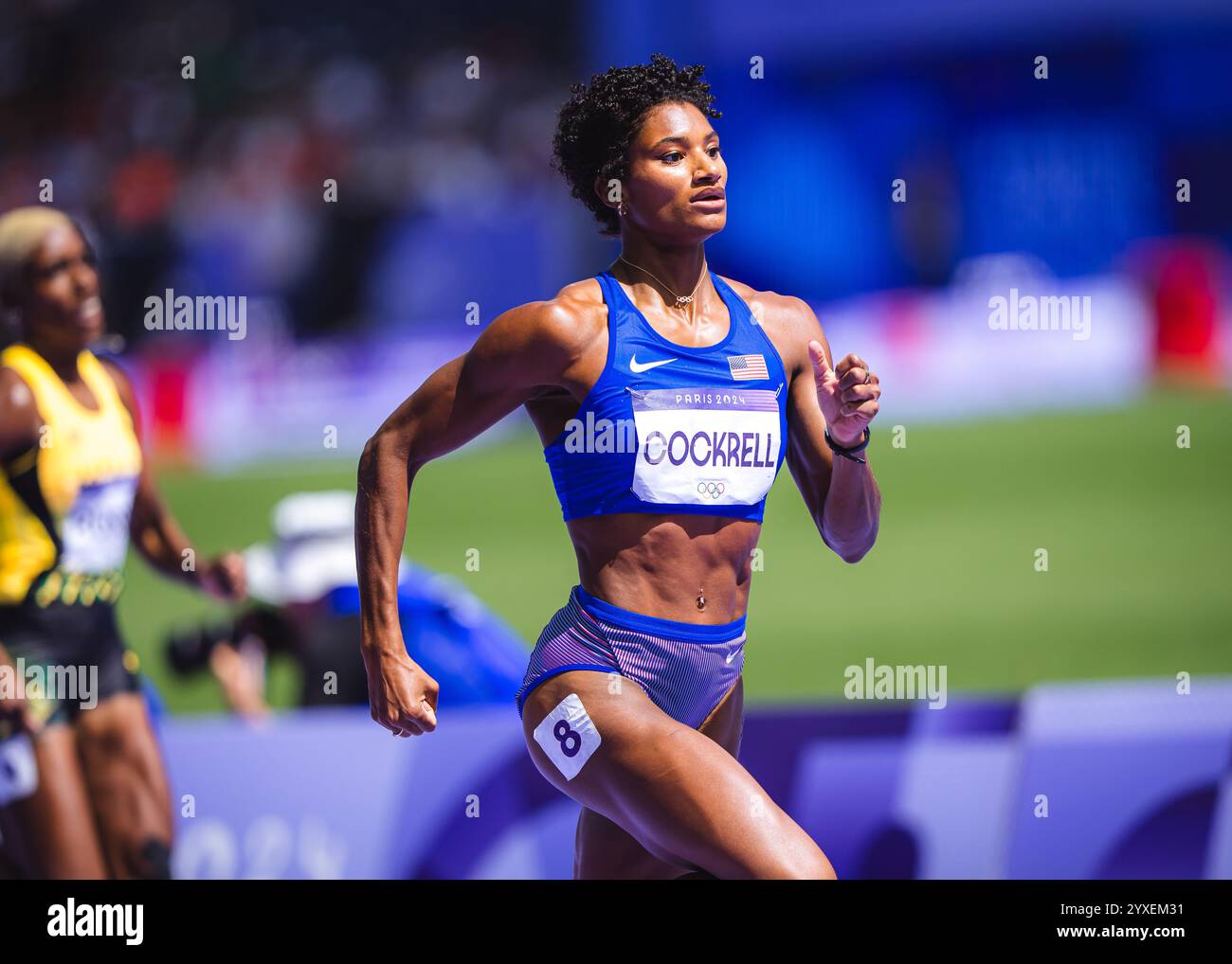 Anna Cockrell participating in the 400 meters hurdles at the Paris 2024 ...