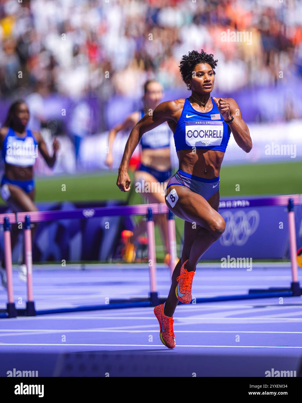 Anna Cockrell participating in the 400 meters hurdles at the Paris 2024 ...