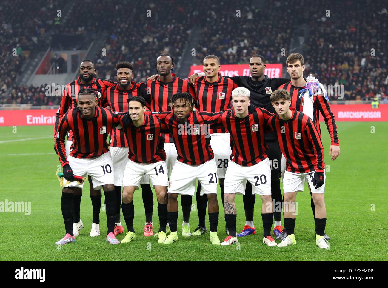 MILAN, ITALY - DECEMBER 15: AC Milan Team line up celebrate 125 years ...