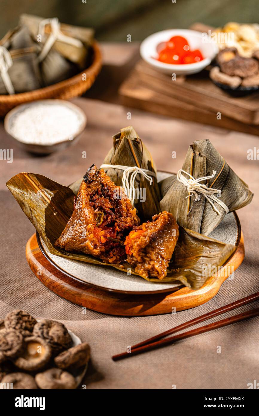 Zongzi is a traditional Chinese food made of glutinous rice stuffed ...