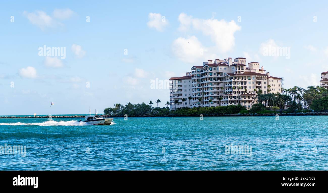 Fisher island residential building and luxury yacht boat. Panorama view ...
