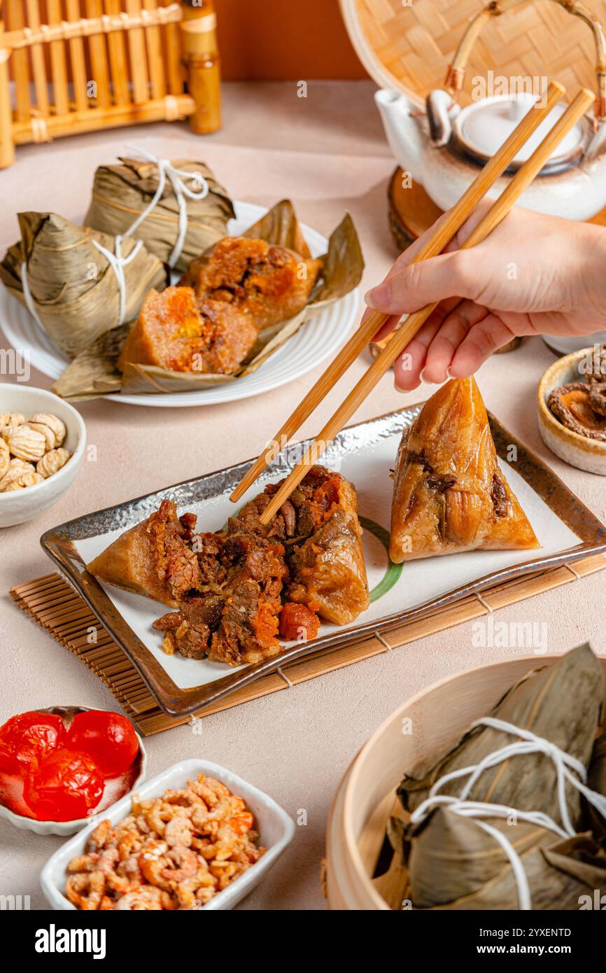 Zongzi is a traditional Chinese food made of glutinous rice stuffed ...