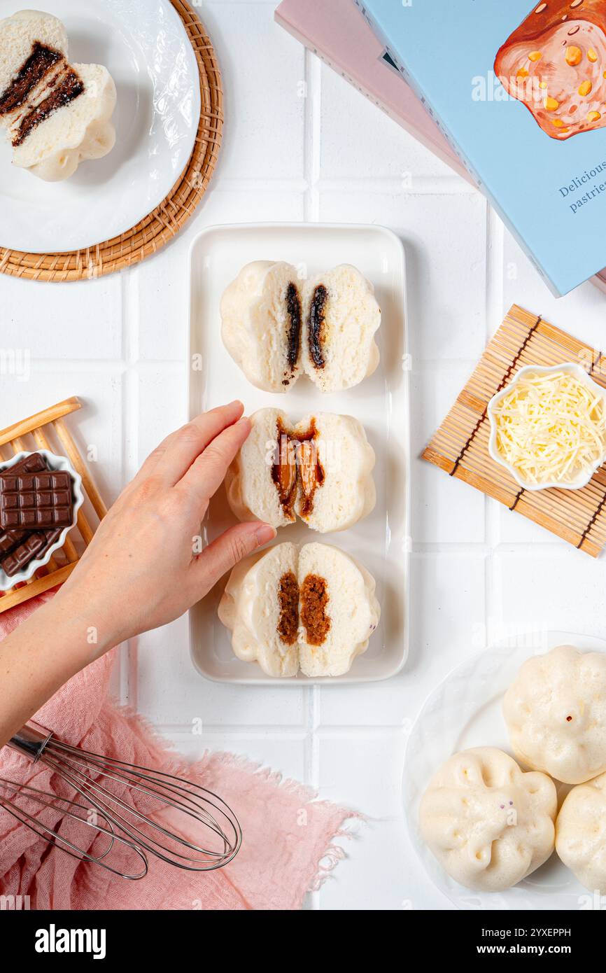 Baozi or Chinese Steamed Buns is a type of yeast-leavened filled bun in ...