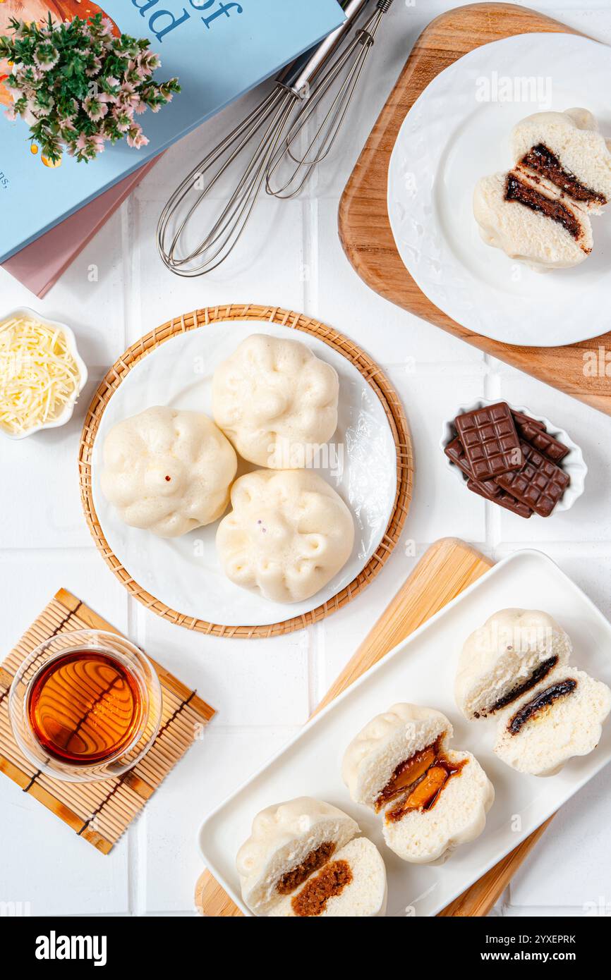 Baozi or Chinese Steamed Buns is a type of yeast-leavened filled bun in ...