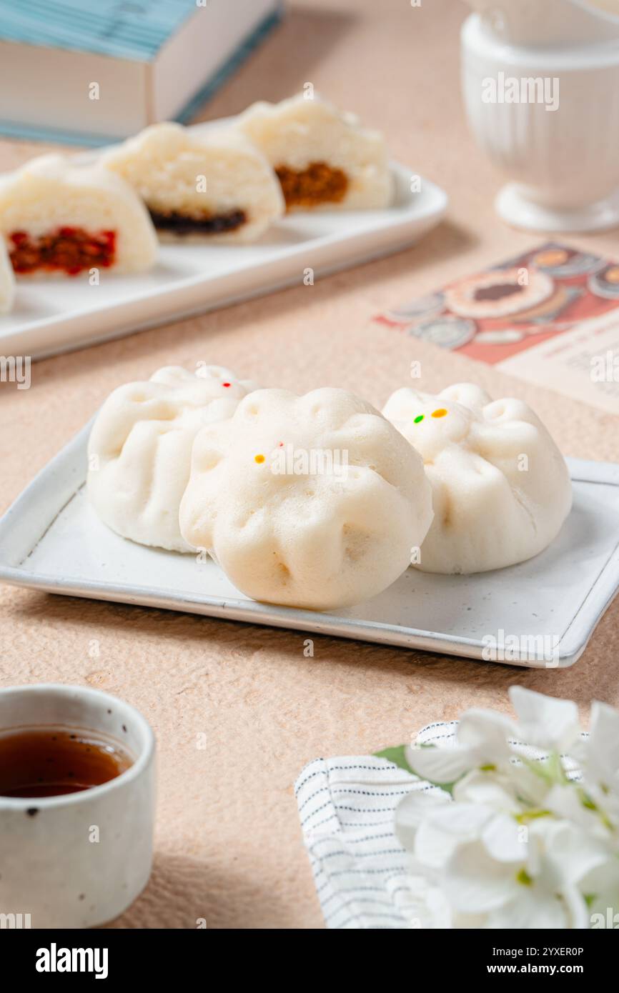 Baozi or Chinese Steamed Buns is a type of yeast-leavened filled bun in ...