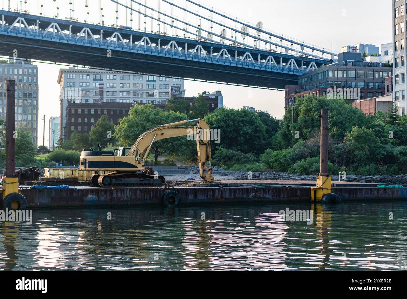 Brooklyn bridge repair with heavy machinery excavator. Construction ...